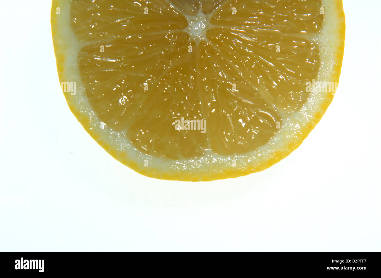 Half cut lemon Stock Photo - Alamy