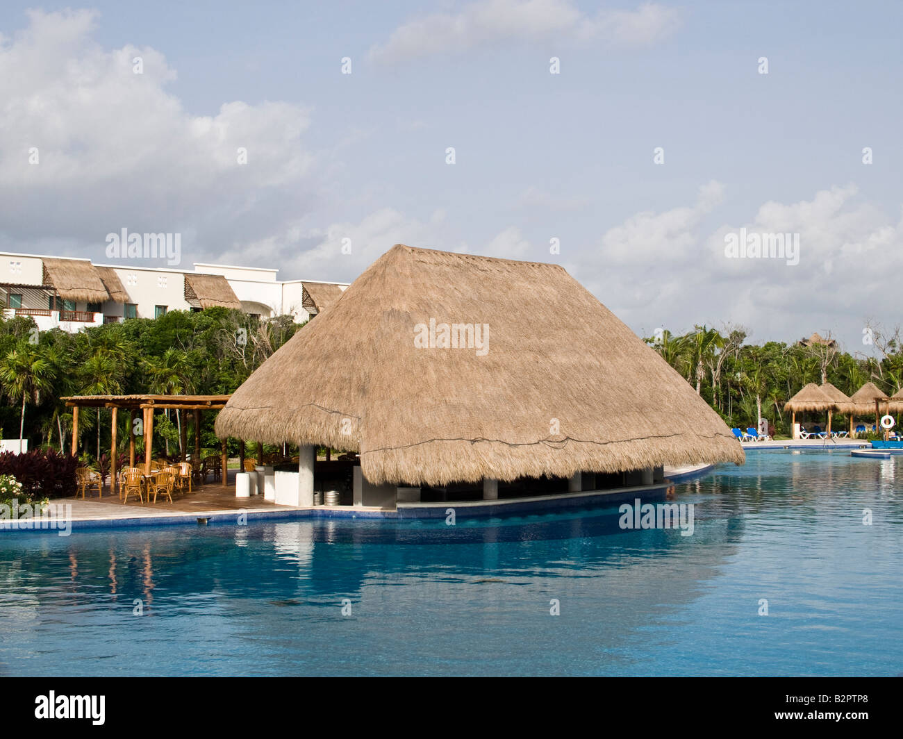Swim up bar at the pool area of the luxury resort hotel Mayan Riviera ...