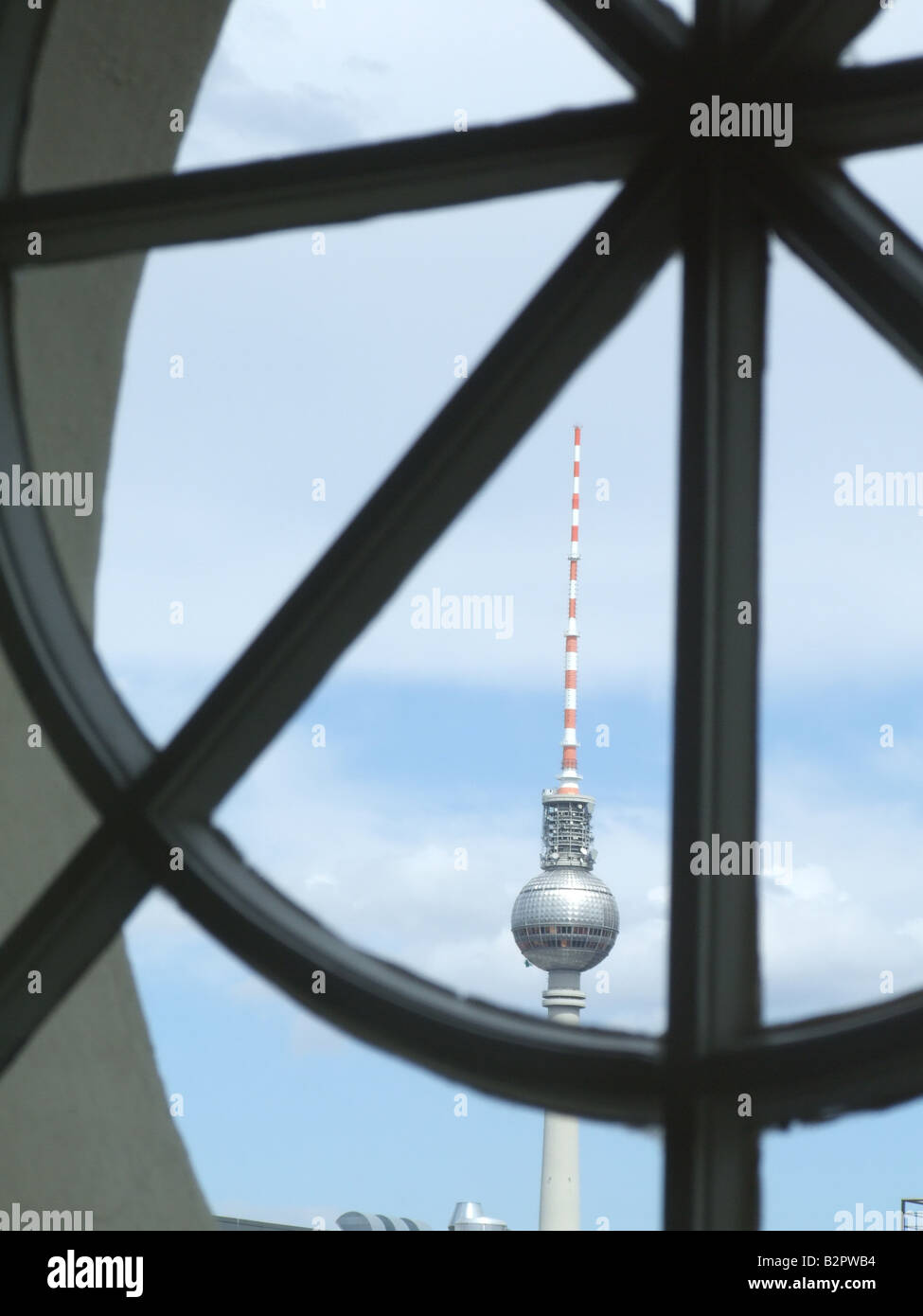 modern tv tower seen through window in berlin Stock Photo - Alamy