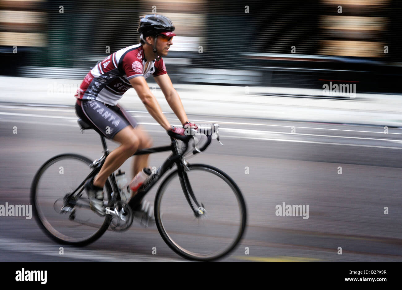Man Riding A Racing Bike Stock Photo - Alamy