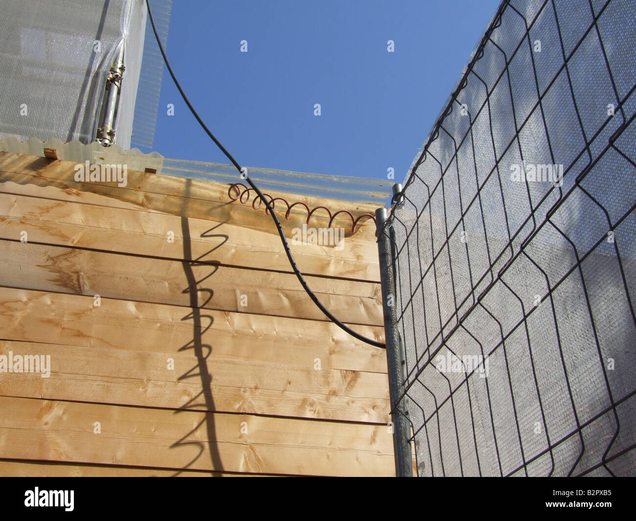 power coil supply shadow on wall at building site Stock Photo - Alamy