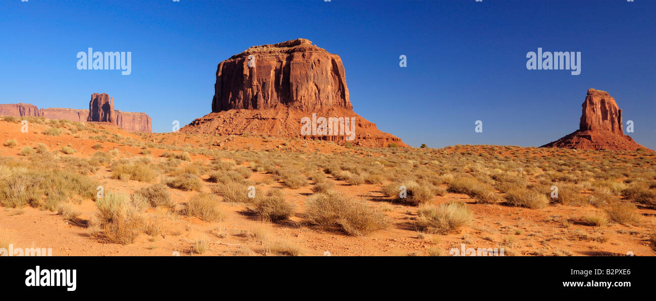 A panorama of Merrick Butte between two Mittens Monument Valley Navajo ...