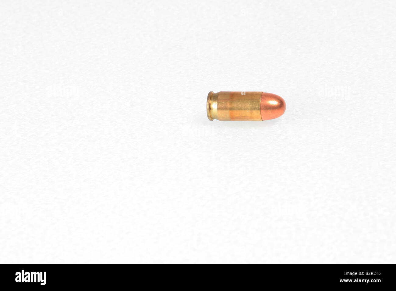 A bullet on a white background. A speeding bullet representation Stock ...
