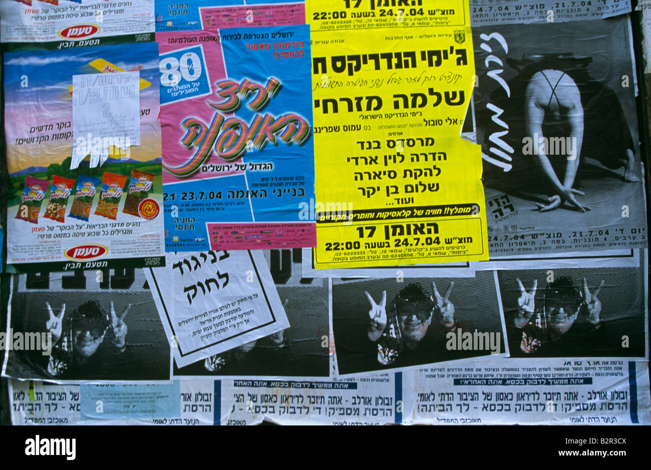 Posters and advertisements on wall, Israel Stock Photo - Alamy