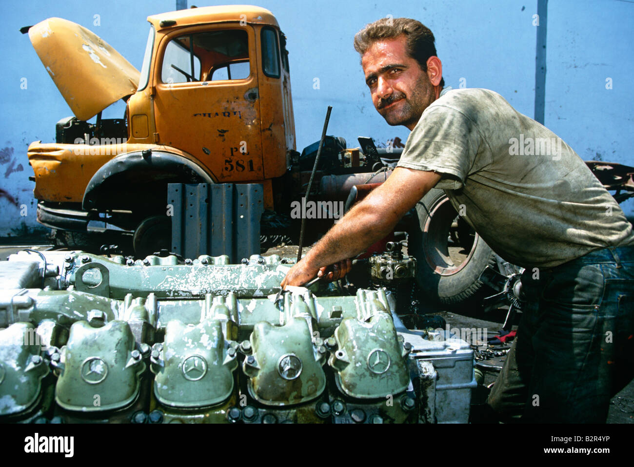 Male mechanic working outside repair garage, portrait, Lebanon, Middle ...