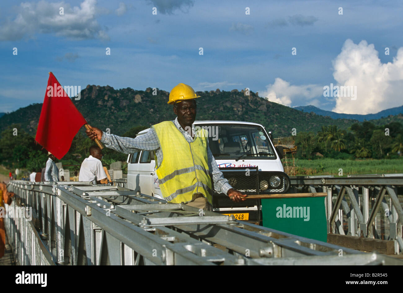 Man directing traffic on a bridge in Malawi Stock Photo - Alamy