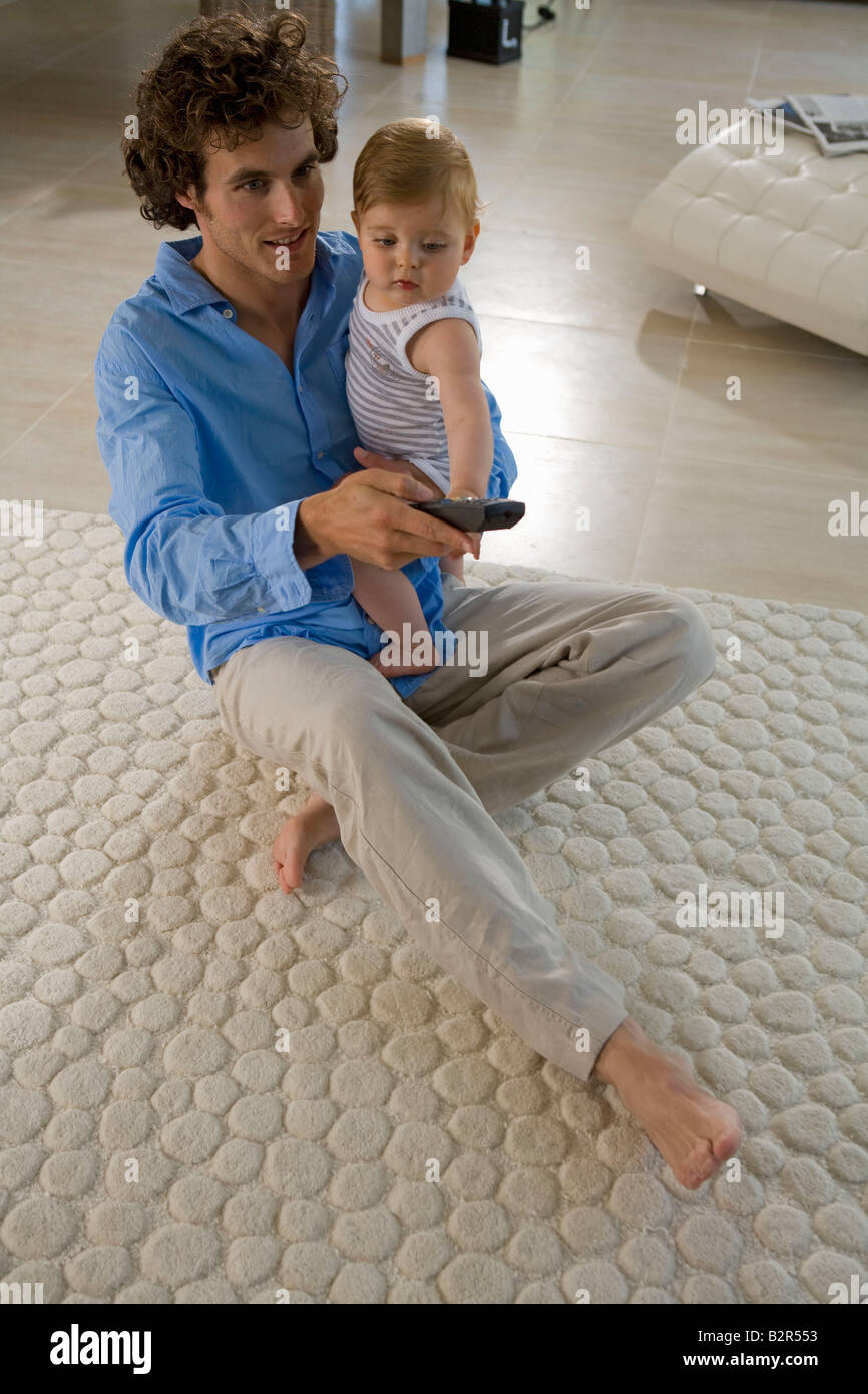 Parent and baby tv hi-res stock photography and images - Alamy