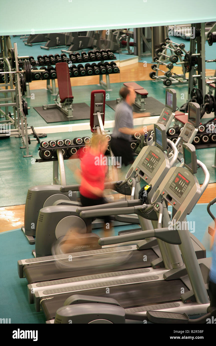 Person on running machine hi-res stock photography and images - Alamy