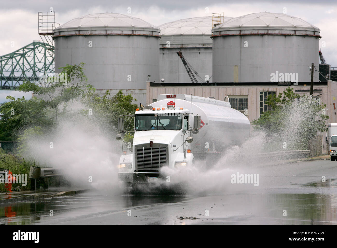 Fuel delivery truck and fuel storage tanks Stock Photo - Alamy