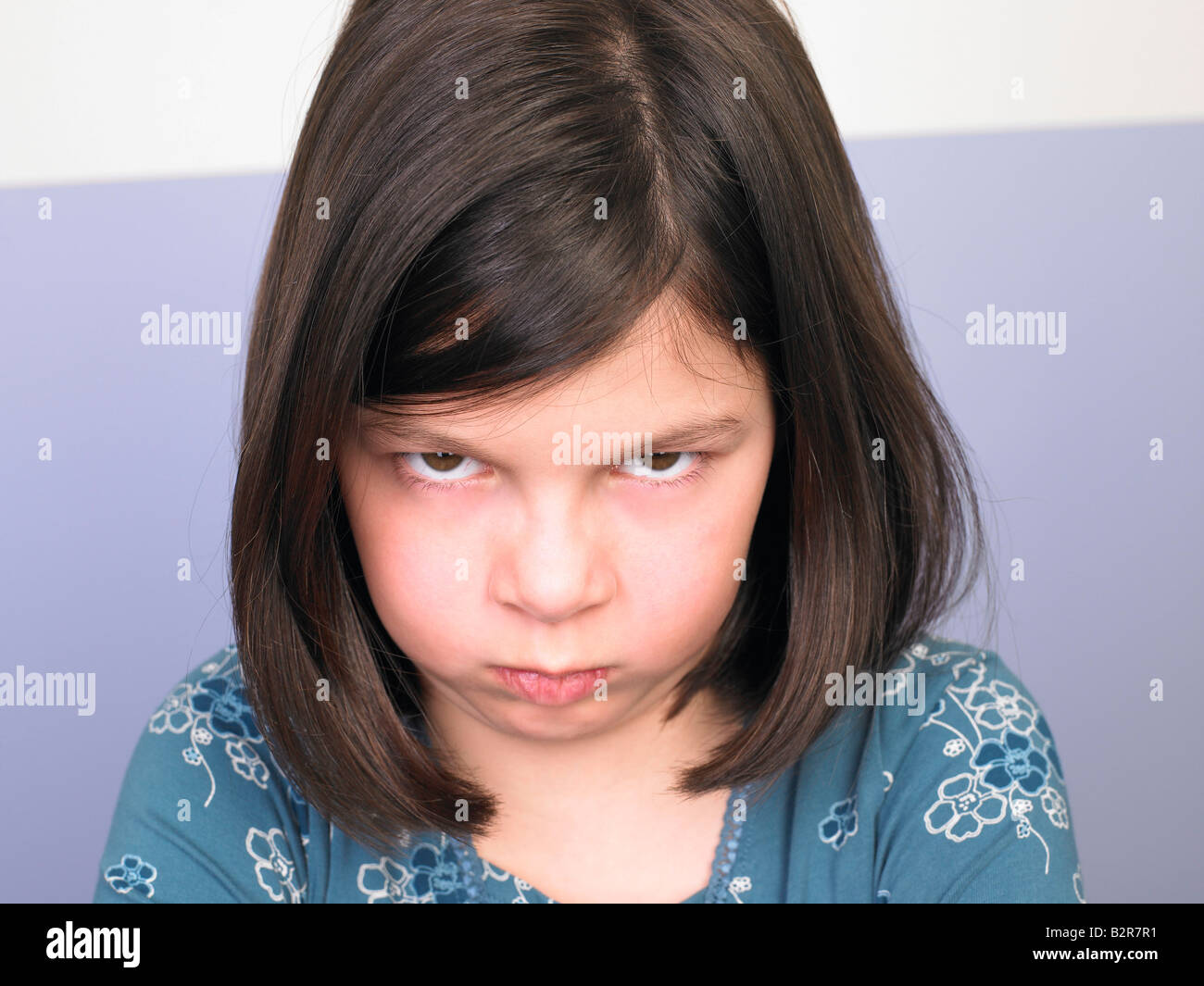 Portrait of a girl, making a face Stock Photo - Alamy