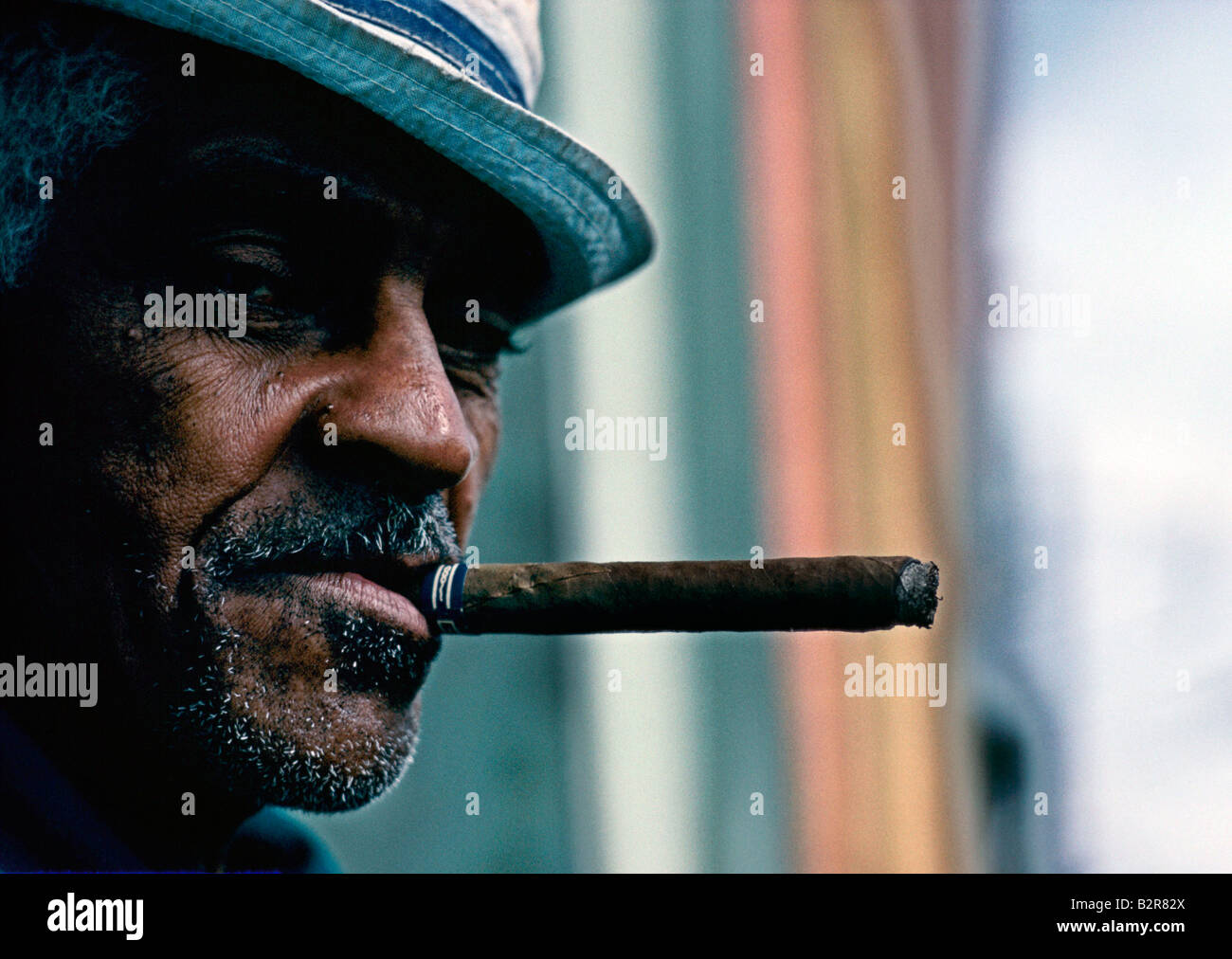 Cuban man smoking a cigar, Cuba Stock Photo - Alamy