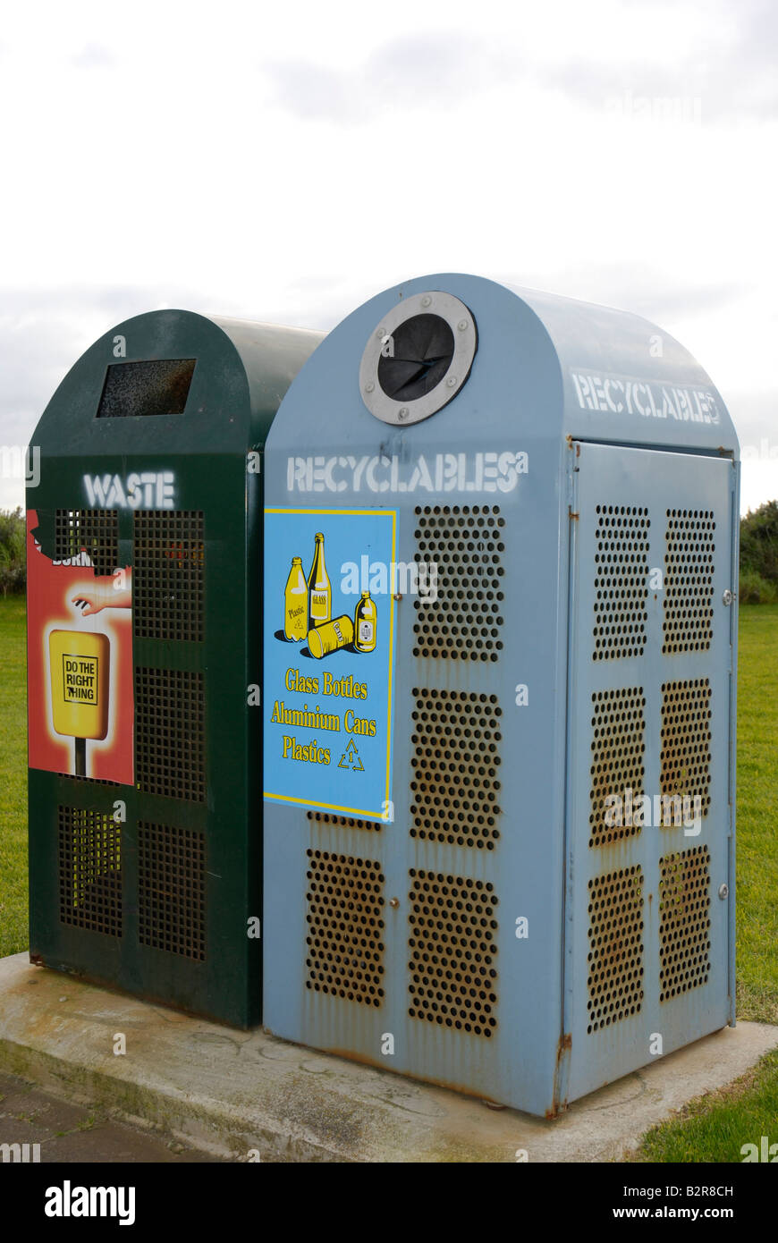 A public bin for collecting recyclable materials next to a rubbish bin ...