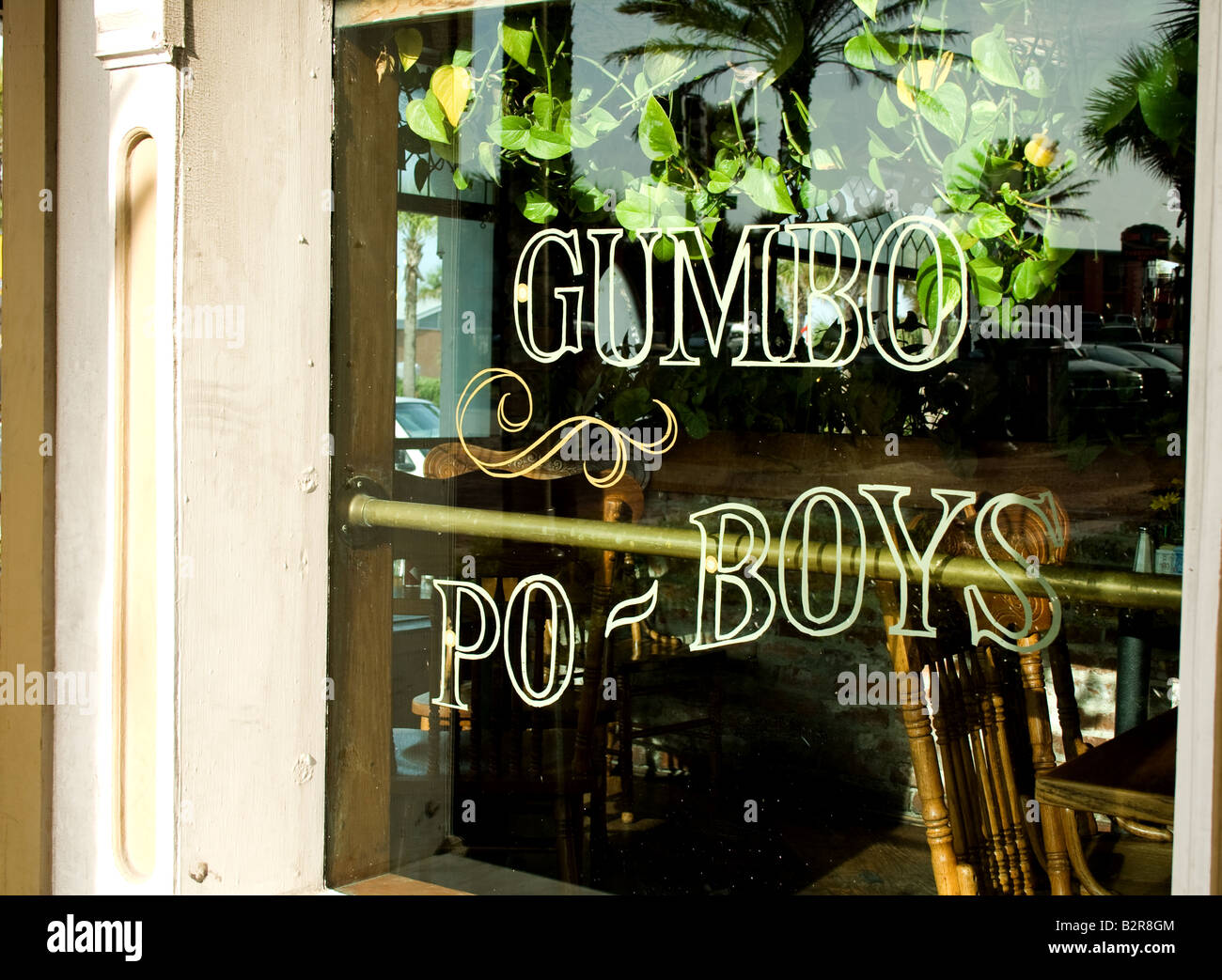 Sign in a restaurant window advertising Gumbo and Po-Boys Stock Photo ...