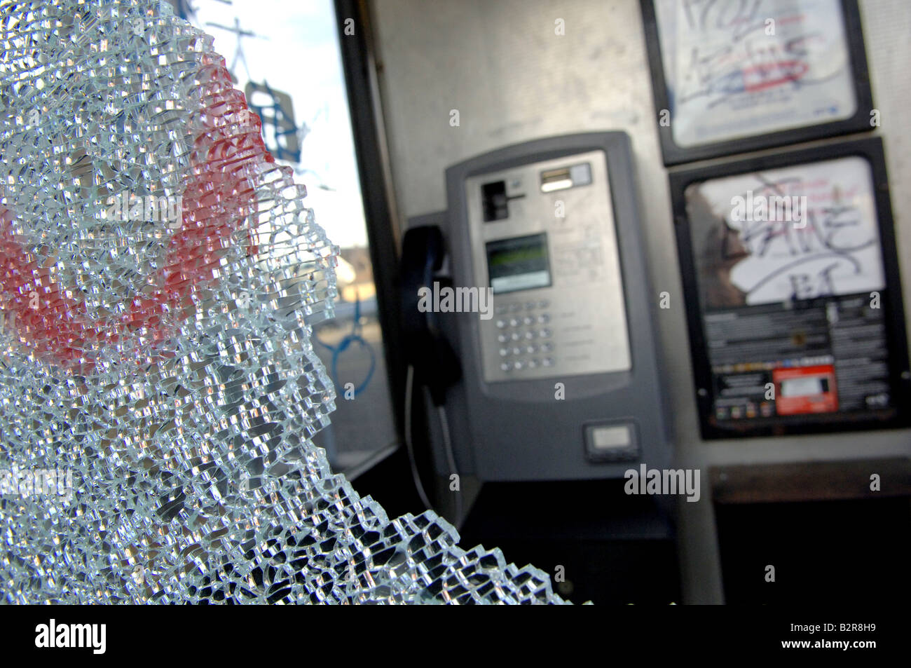 smashed telephone kiosk Stock Photo - Alamy