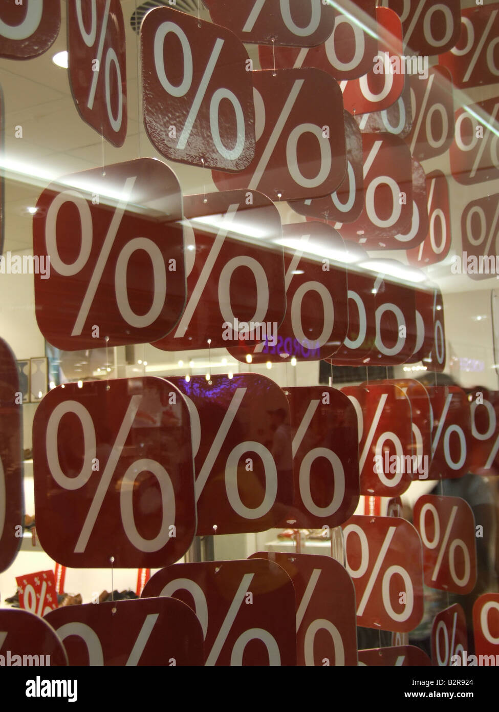 percentage symbols in window in shopping centre Stock Photo - Alamy