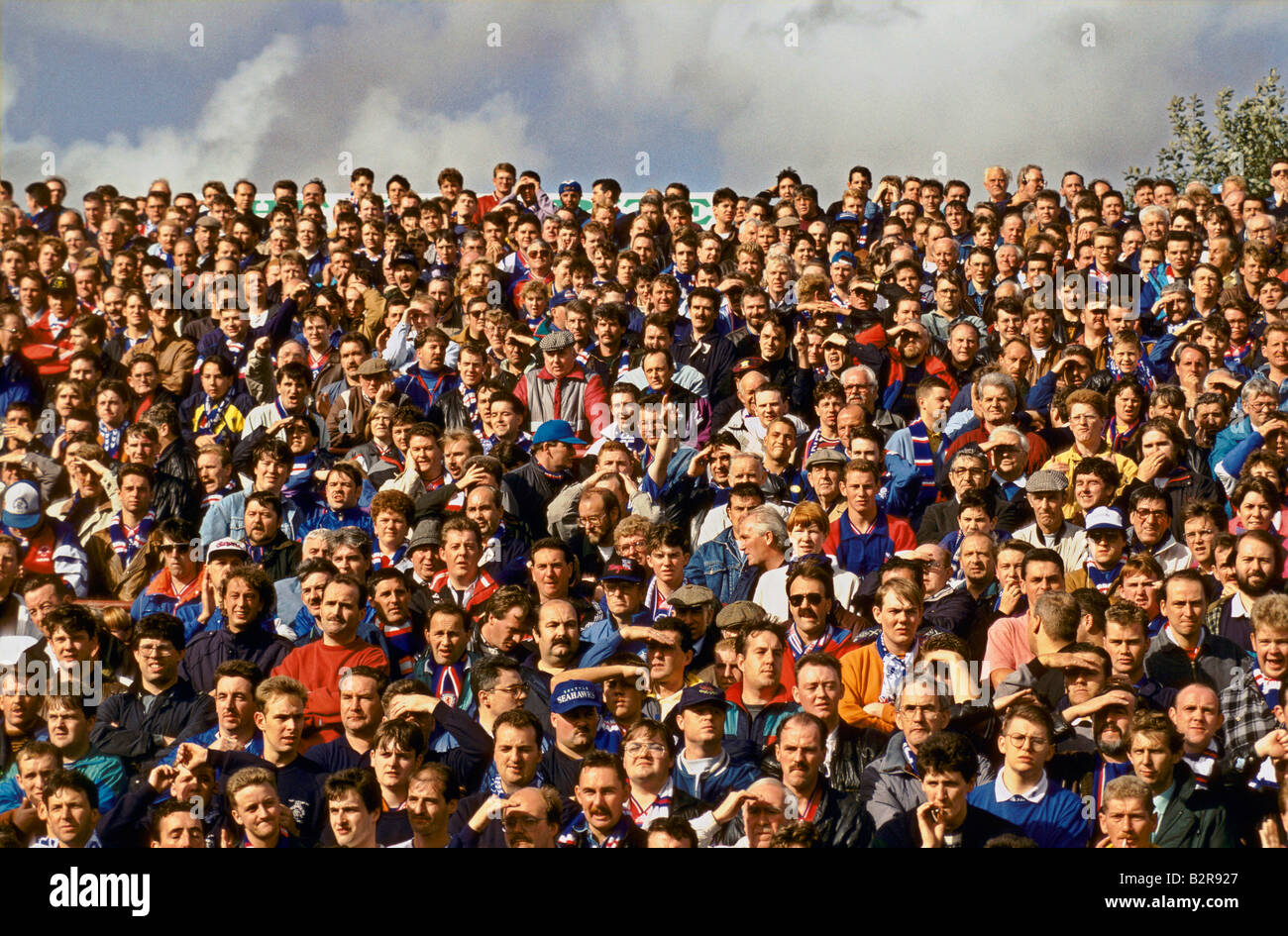 a crowd of glasgow rangers football fans watching a match from the ...