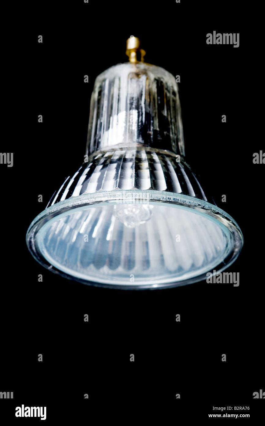 small halogen lightbulb isolated on black background Stock Photo - Alamy