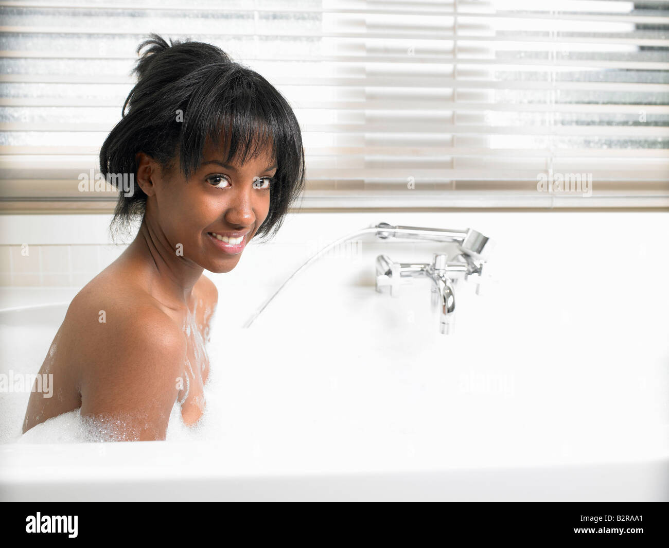 Woman in bath Stock Photo - Alamy
