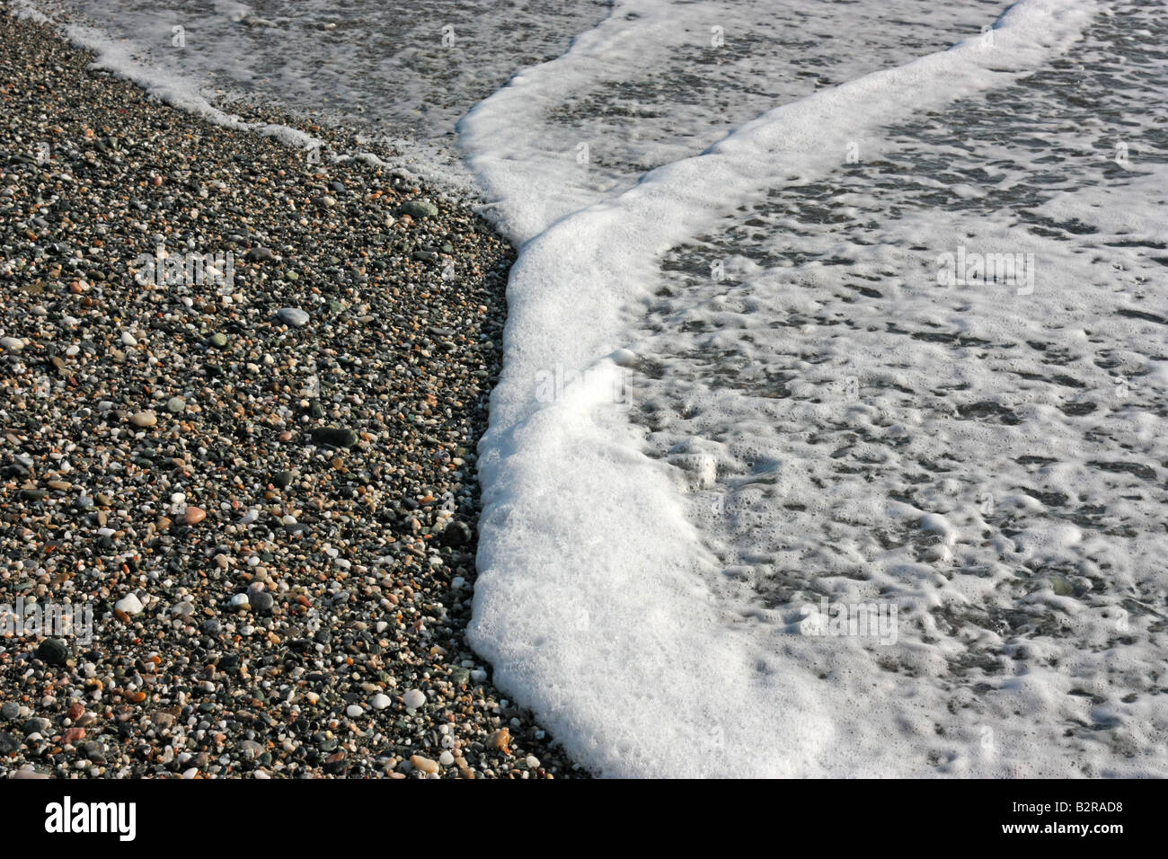 The pattern on the beach created by the foam of a broken wave Stock ...