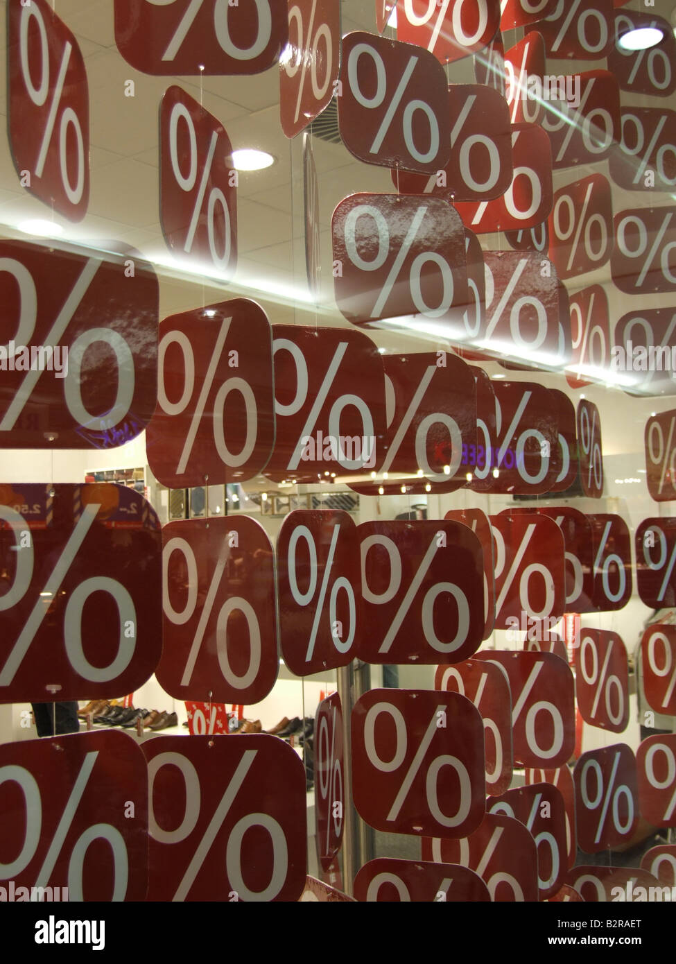 percentage symbols in window in shopping centre Stock Photo - Alamy