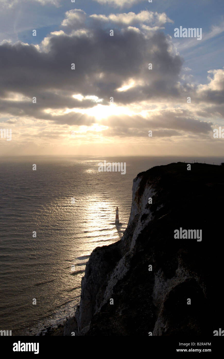 The lighthouse and cliffs at Beachy Head at sunset, Sussex, UK Stock ...
