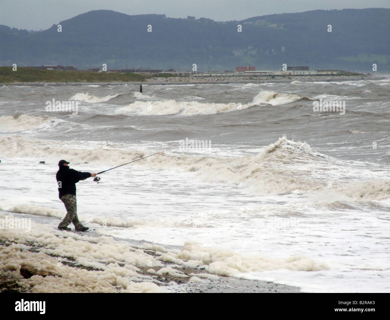 man sea fishing in rhyl in north wales Stock Photo - Alamy