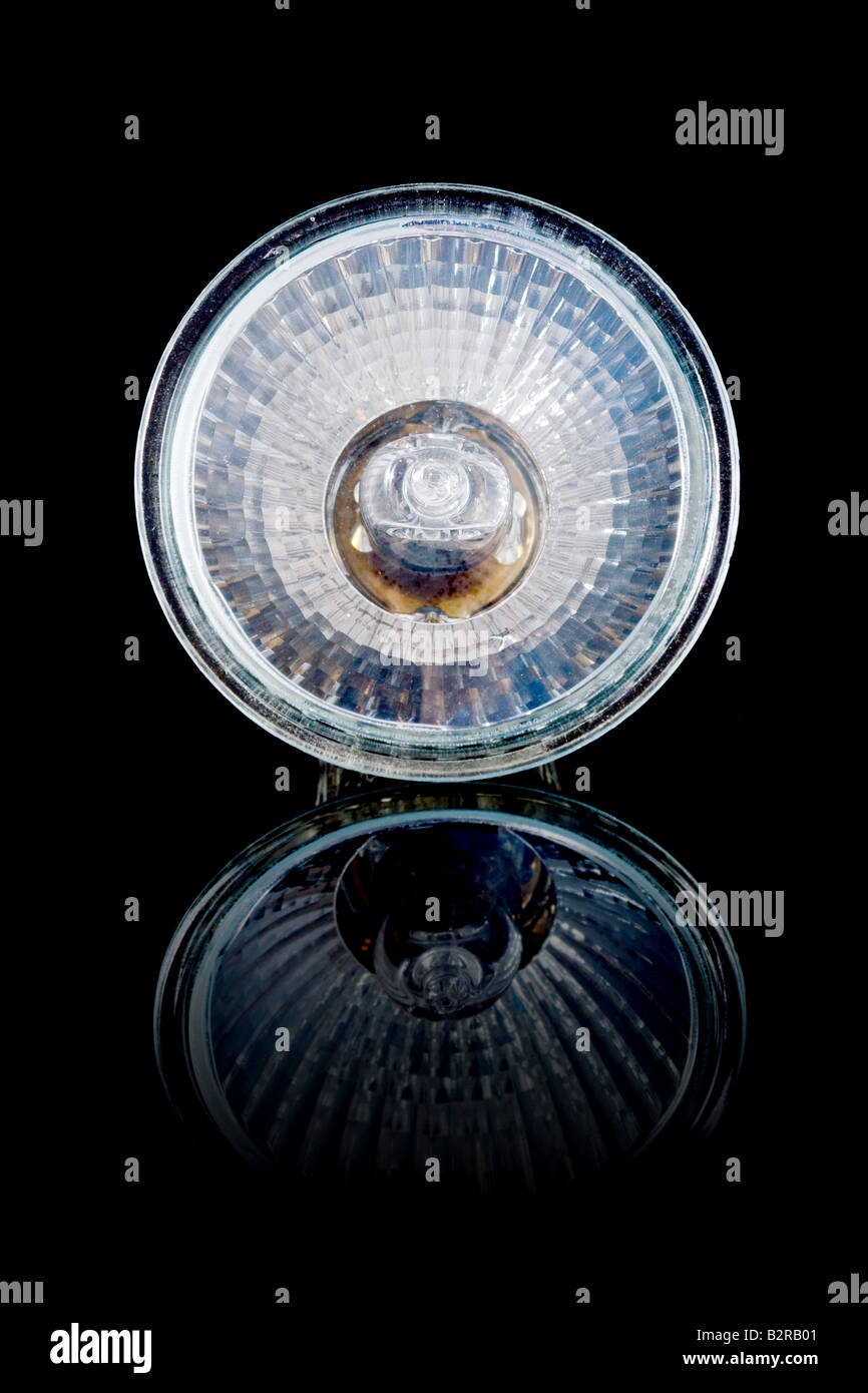 small halogen lightbulb isolated on black with reflection Stock Photo ...
