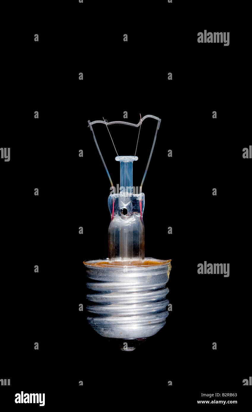 broken lightbulb isolated on black background Stock Photo - Alamy