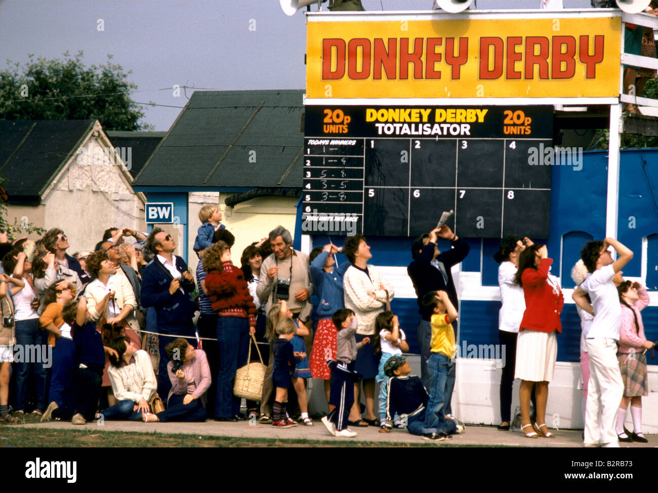 people at the donkey derby butlins Stock Photo - Alamy