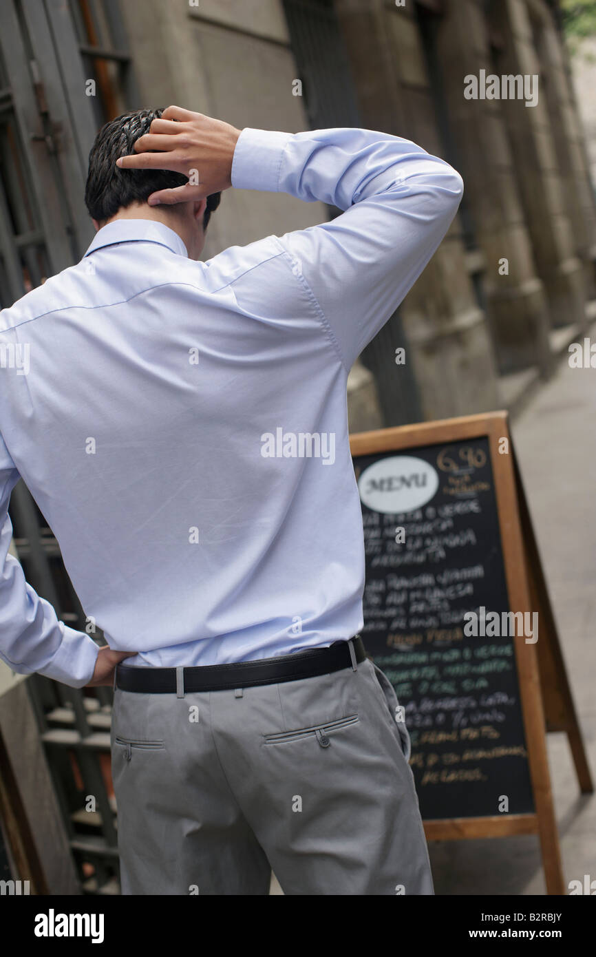 Menu contemplation hi-res stock photography and images - Alamy