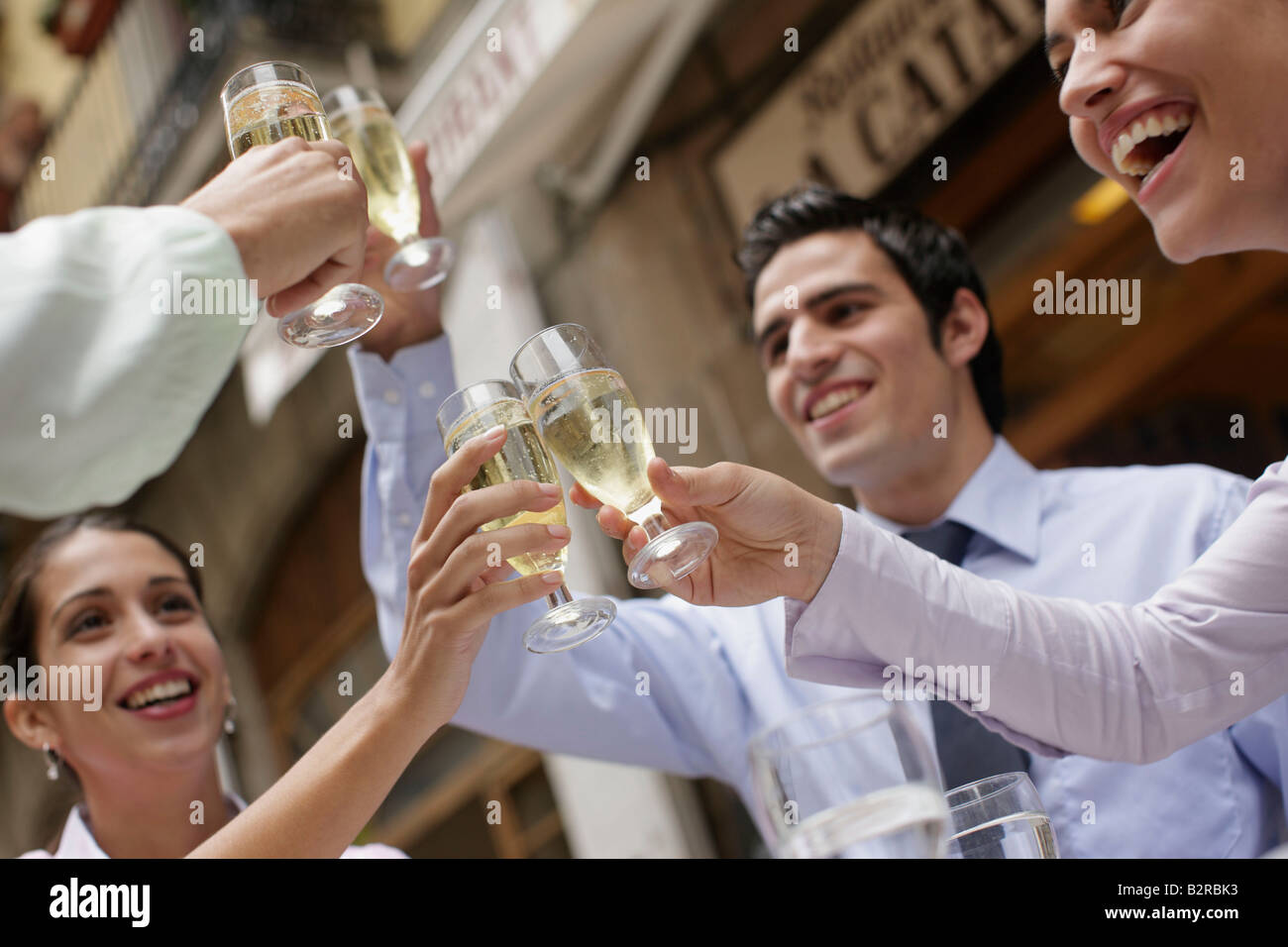Business team toasting each other Stock Photo - Alamy