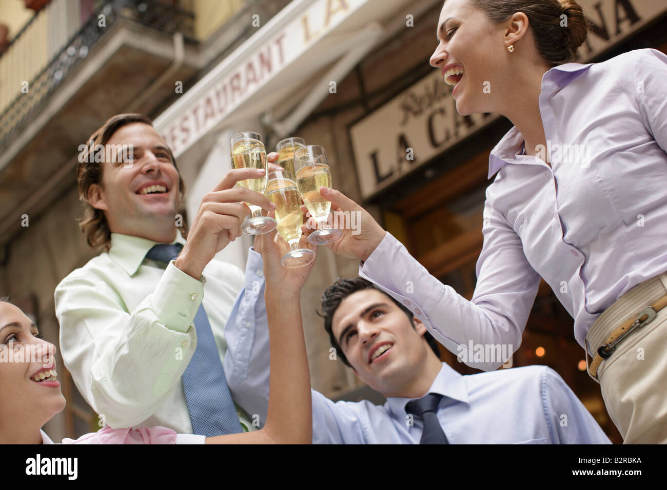 Business team toasting each other Stock Photo - Alamy