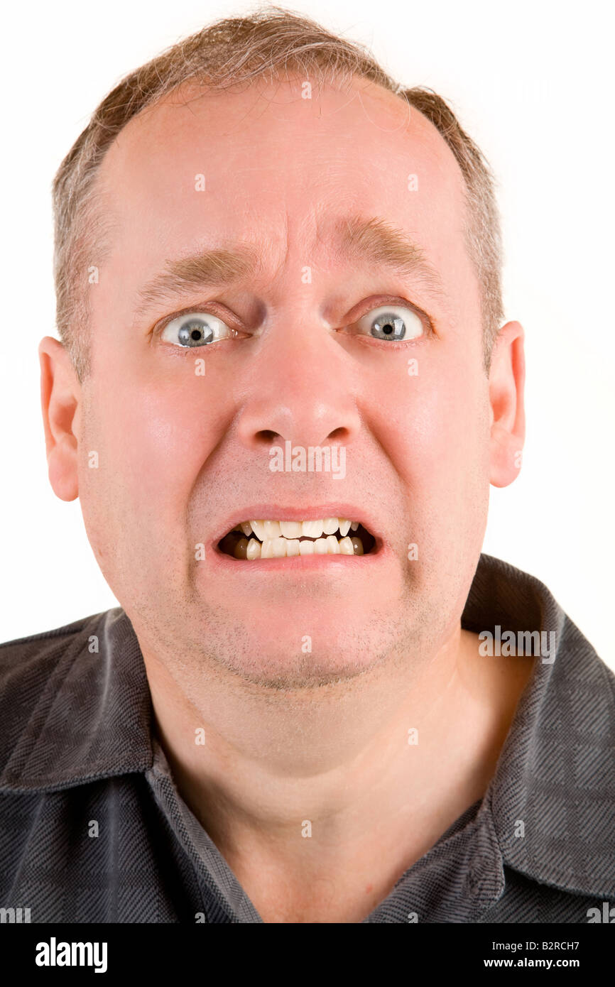 Portrait of someone being stressed out isolated on white Stock Photo ...