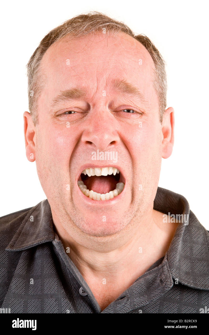 A middle aged man is screaming for help Stock Photo - Alamy