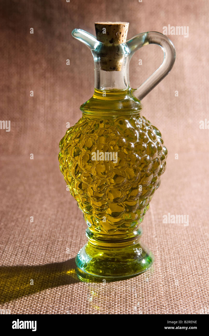 Still life of a small jar filled with extra virgin olive oil Stock ...