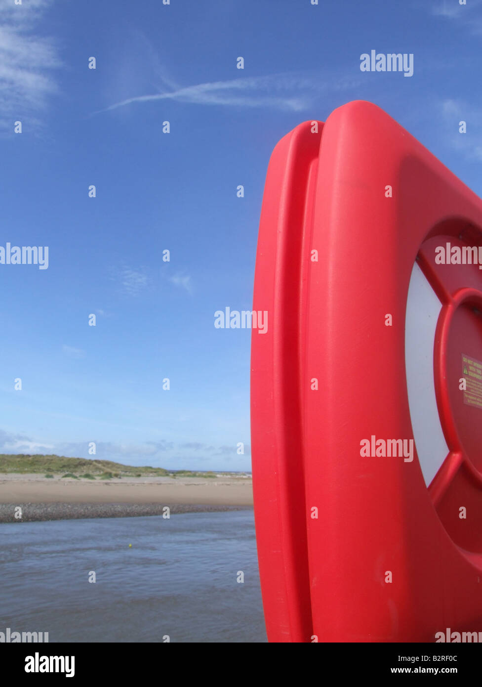 rubber ring at sos point in maritime port in uk Stock Photo - Alamy