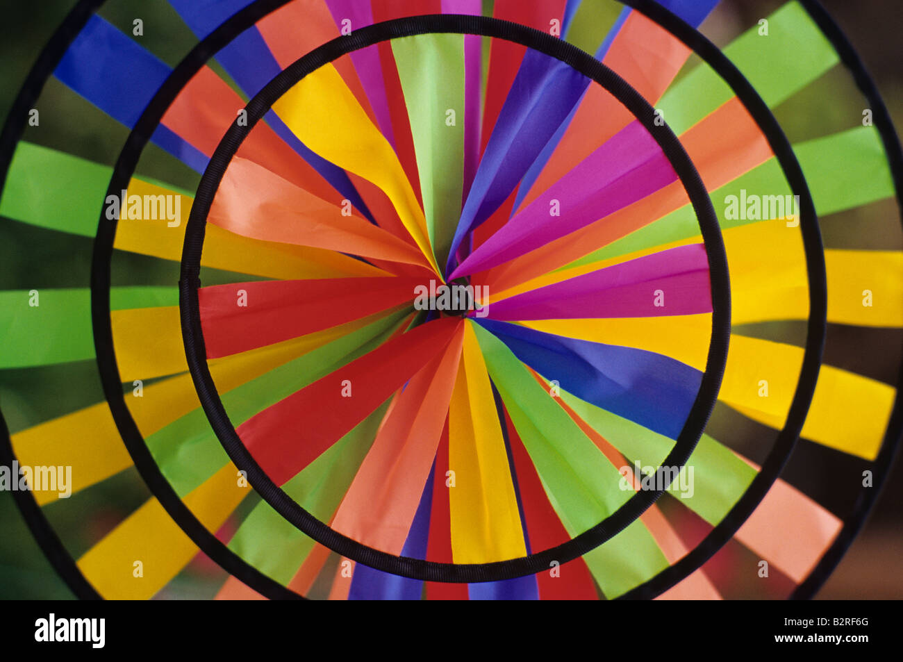 Multi colored close up of a pinwheel Stock Photo - Alamy