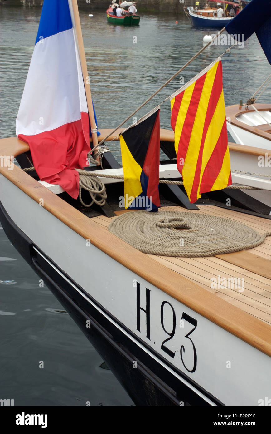 The stern and flags of the restored French pilot cutter boat Marie ...