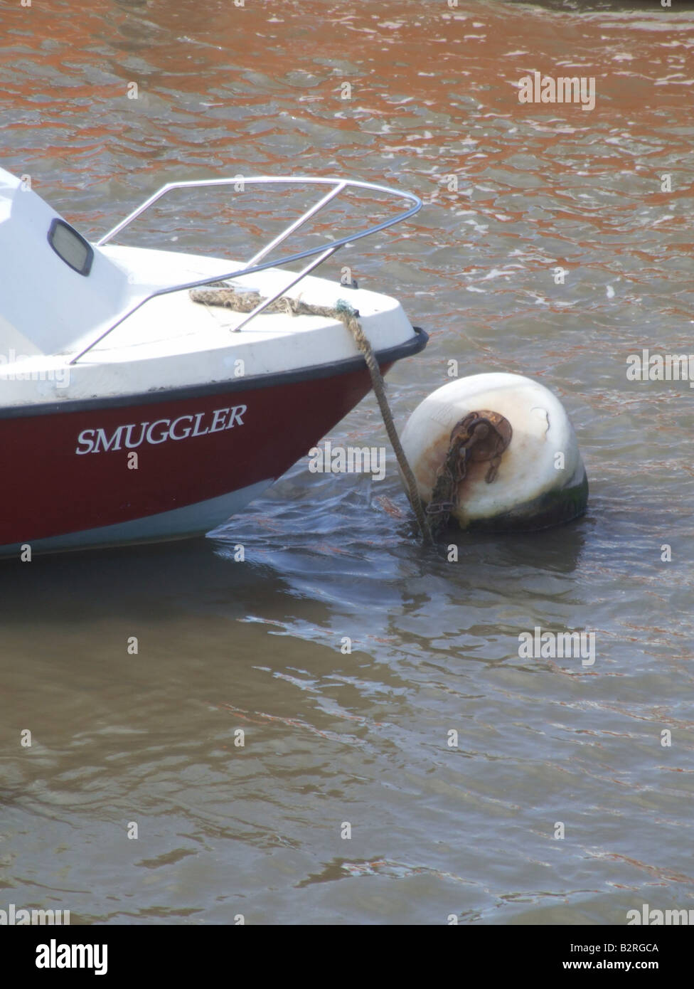 a boat called smuggler in a sea port dock Stock Photo - Alamy