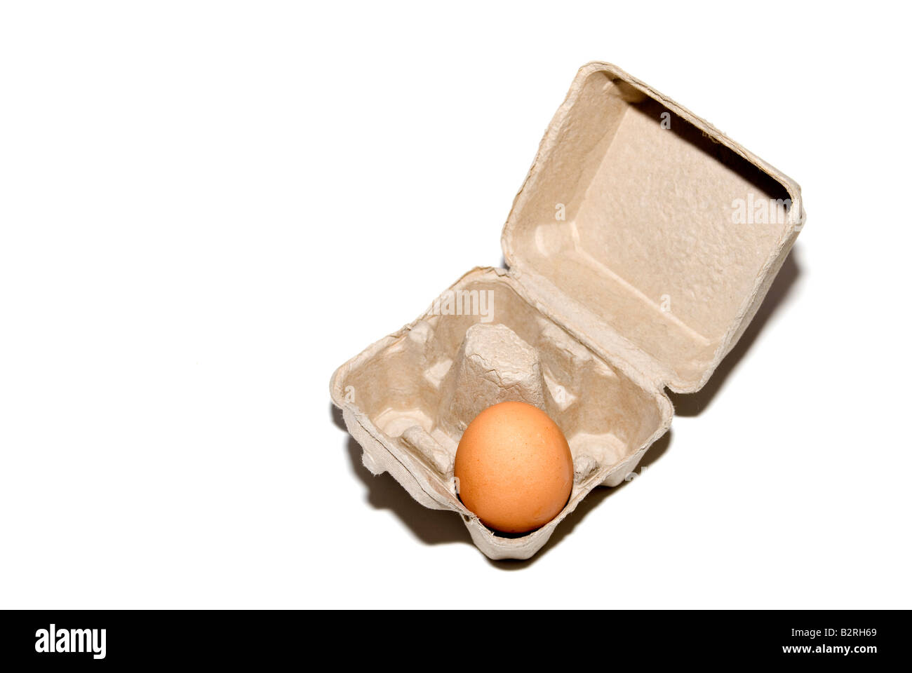 A larger egg in a box Stock Photo - Alamy