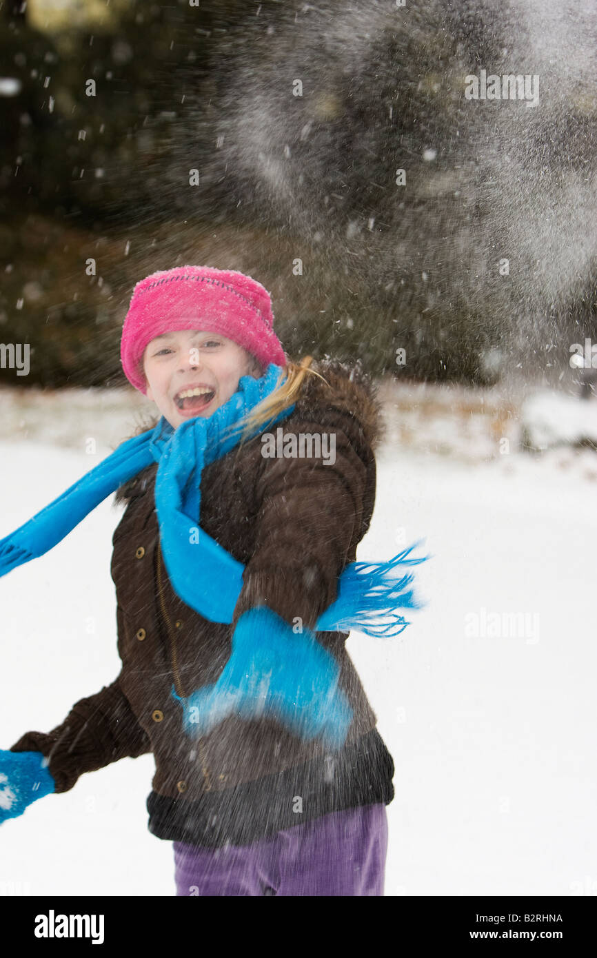 Child throwing a snowball Stock Photo - Alamy