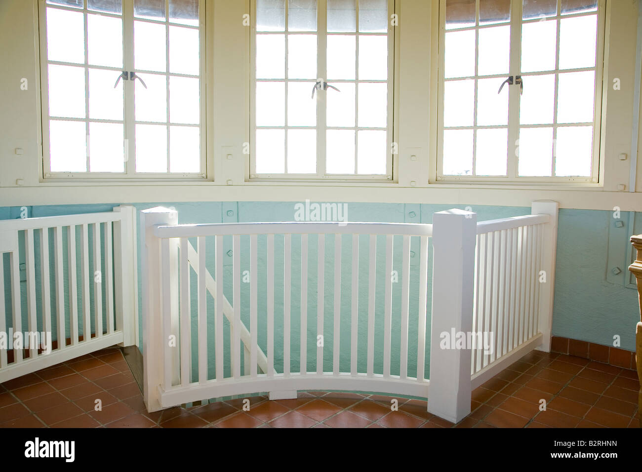 Safety railing for a steep downward staircase Stock Photo - Alamy