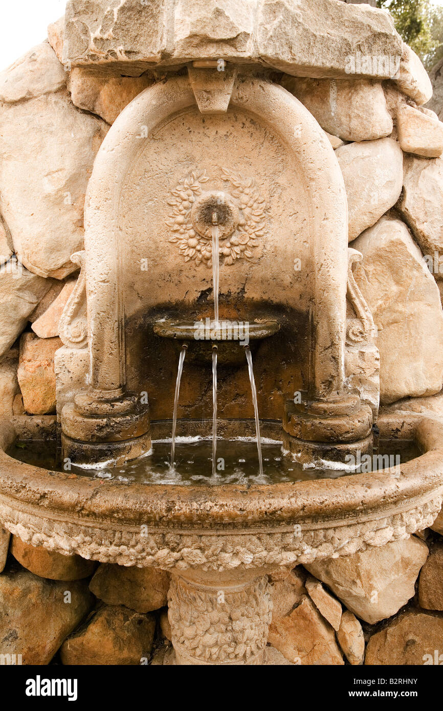 Detail of a stone fountain Stock Photo - Alamy