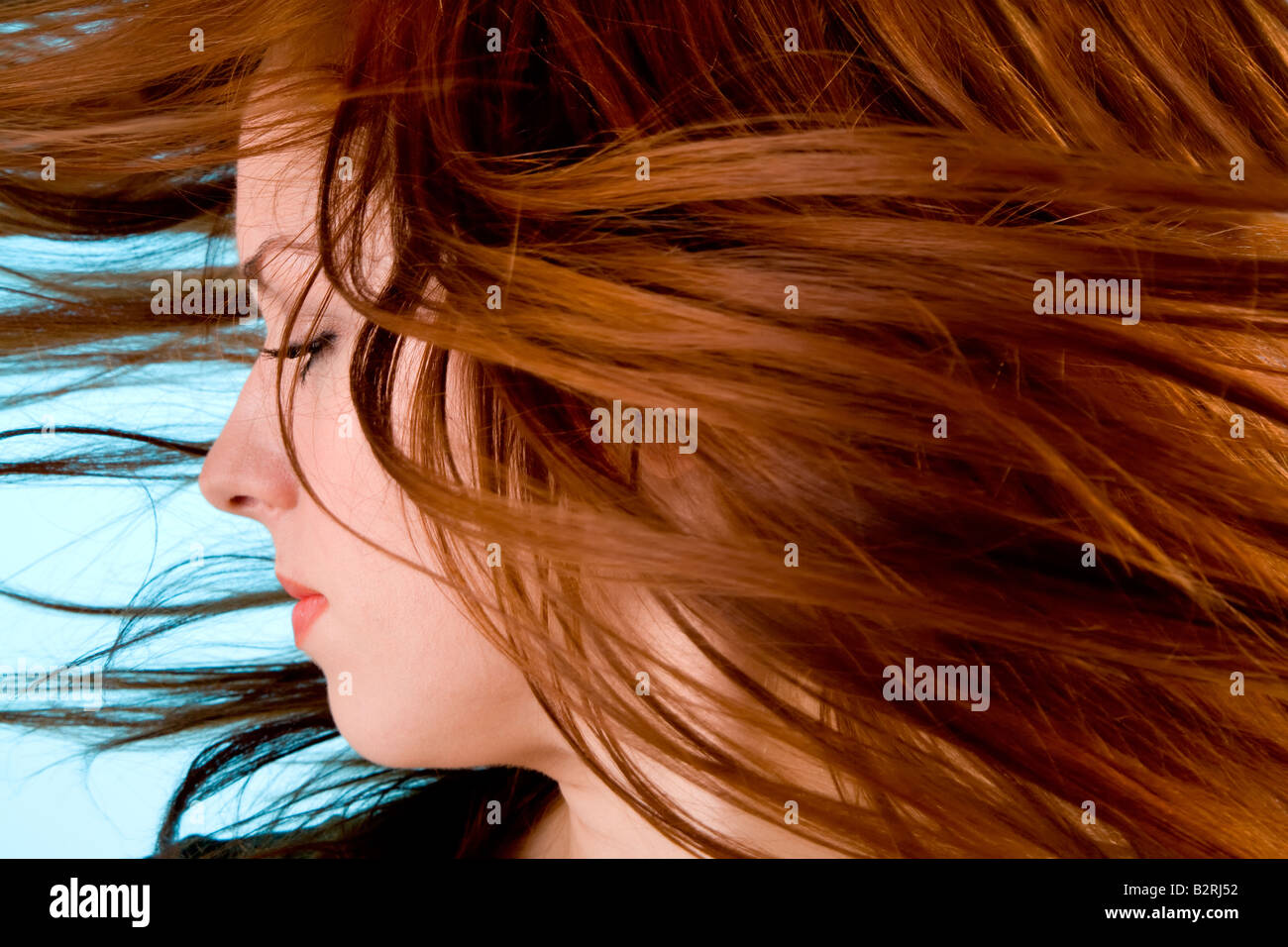 Hair blown in face by wind hi-res stock photography and images - Alamy