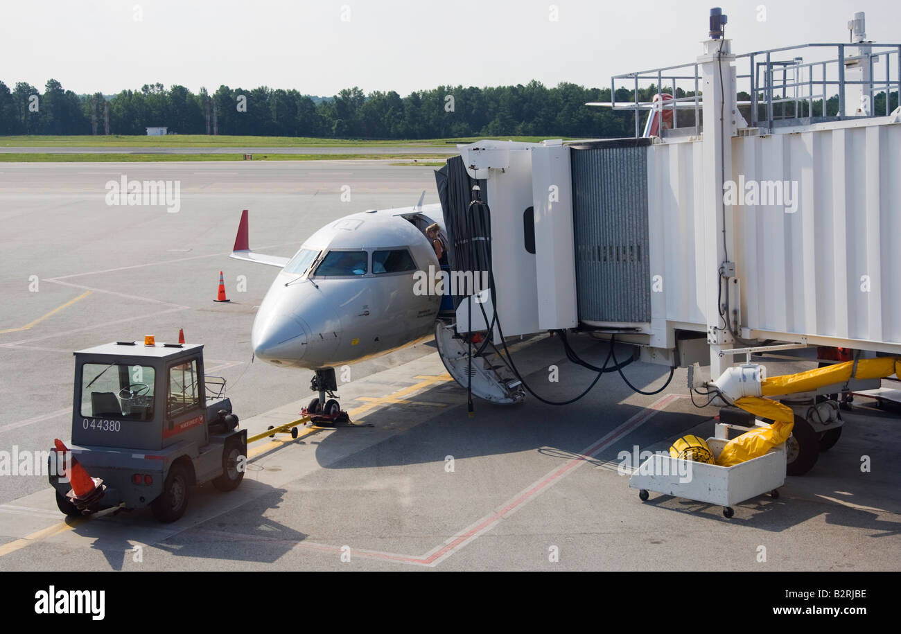 Passengers boarding an aircraft Stock Photo - Alamy