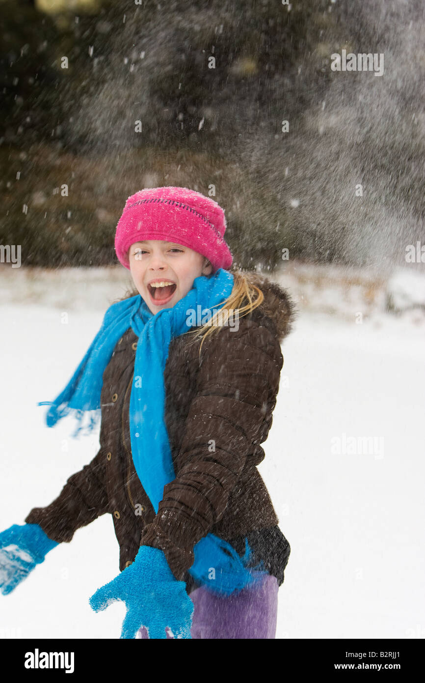 Child throwing a snowball Stock Photo - Alamy