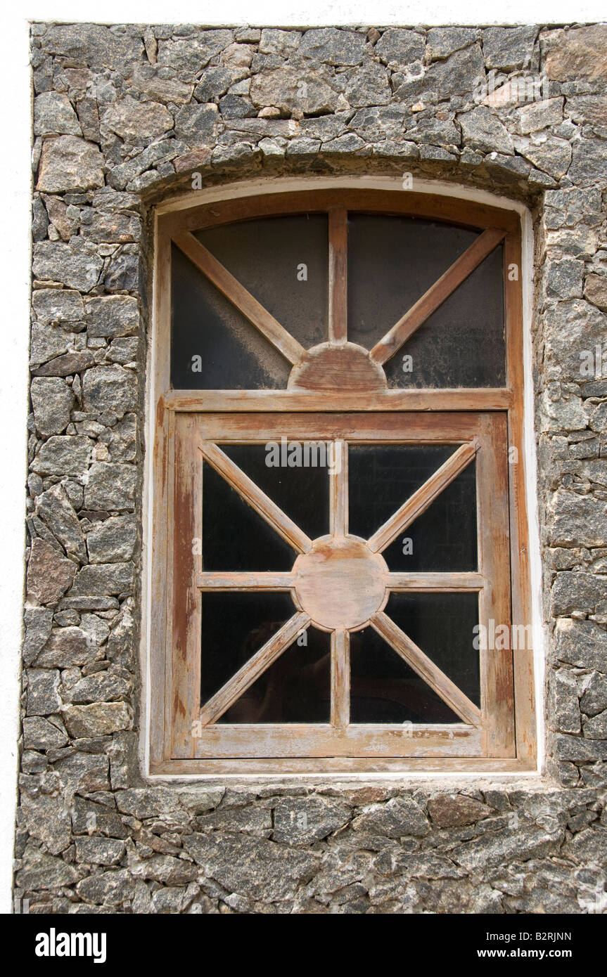 wooden window surround in stonework Stock Photo - Alamy