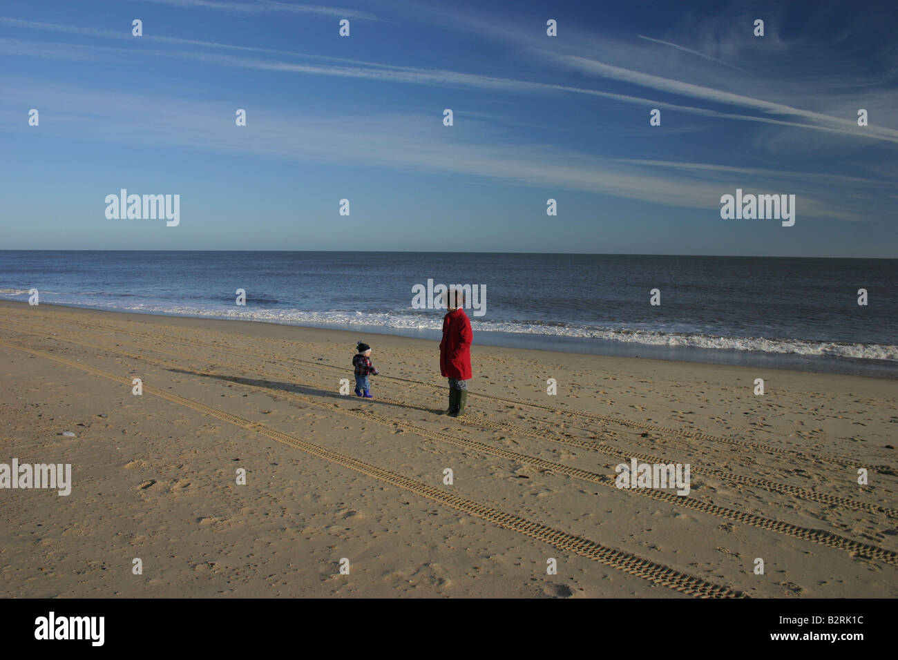Family cold beach hi-res stock photography and images - Alamy