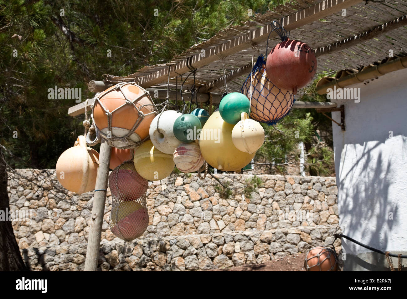 Floats at a divers shack at Cala Tuent, Mallorca, Spain Stock Photo - Alamy