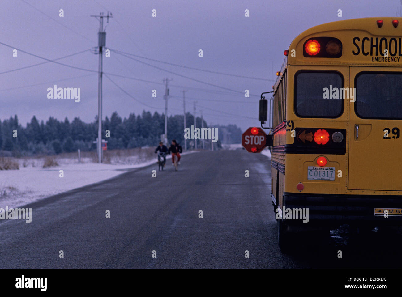 Country road rural America a yellow school bus on a cold winter morning ...